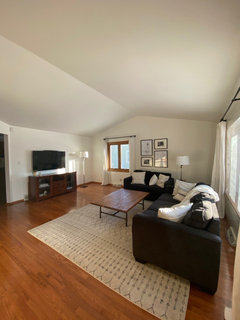 Couch off center of window