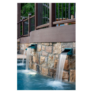 Luxury vanishing edge pool with copper scuppers - Rustic - Other - by ...