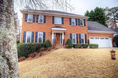 What do you suggest? House sideways on lot, "Front" door on side.