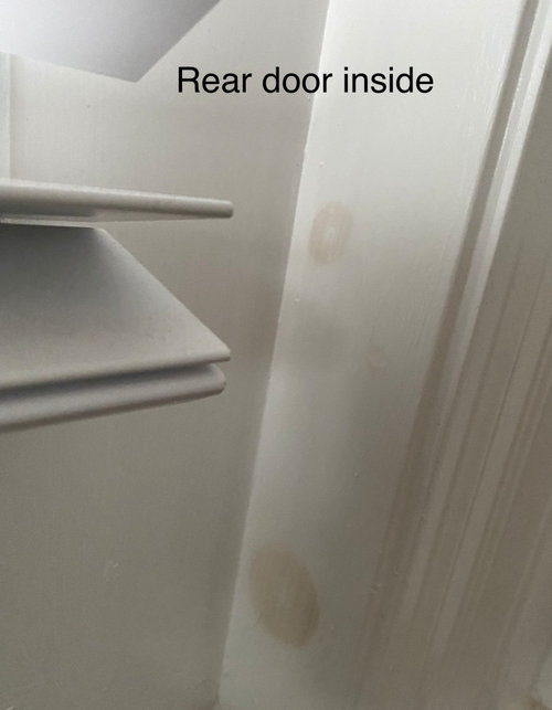 Paint discoloration around front and rear door trim