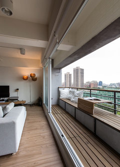 Long narrow L shape condo balcony