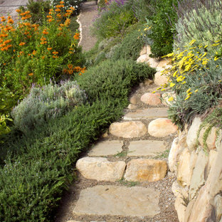 75 Most Popular Mediterranean Garden with a Retaining Wall Design Ideas ...