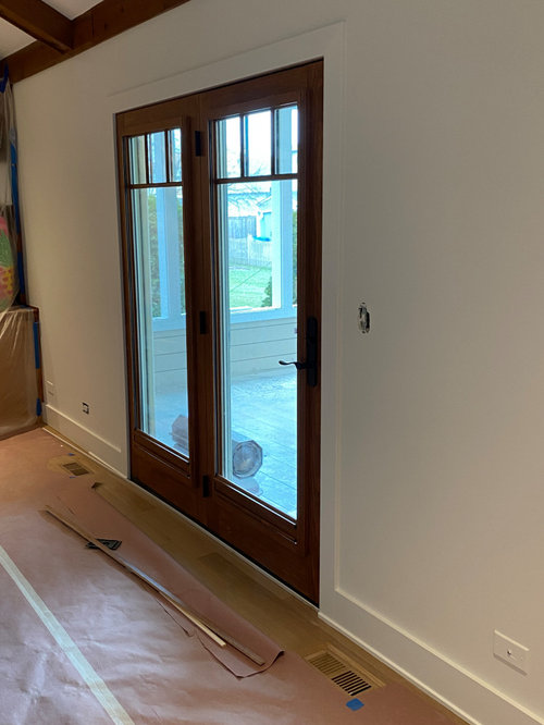 Need a quick decision: White or stained bottom trim for the door?