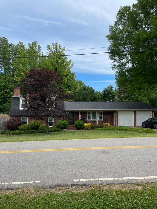 Ideas to improve 70s split level mansard roof exterior?