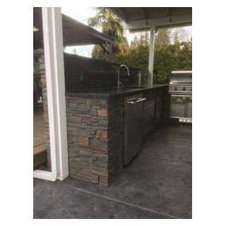 Keystone Stacked Stone Outdoor Kitchen Idea - Patio - Denver - by ...