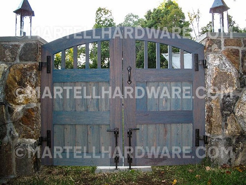 Double Arched Gates Entrance featuring Coastal Bronze Gate Hardware