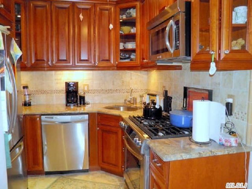 8X7 kitchen design questions - to move fridge or not