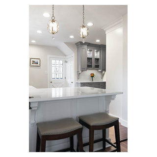 Classic Pendant Lighting Above Peninsula Seating - Traditional - Other ...