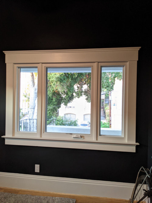 Outside mount shade on window with decorative trim