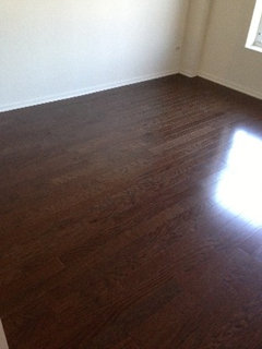 Hardwood flooring with existing golden oak trim and cabinets