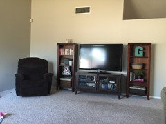 Off center couch in front of window -help?