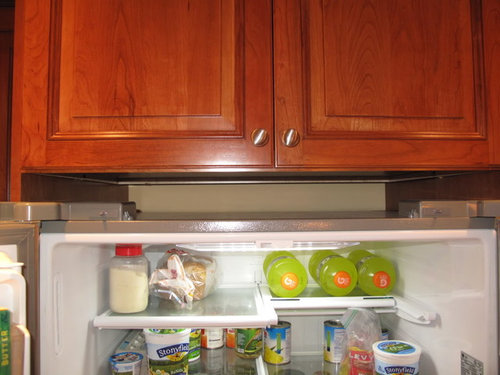 Do you have a gap between the top of your frig and cabinet above?