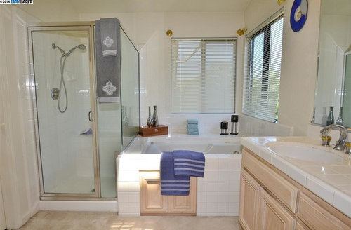 Need help with awkward master bathroom layout