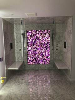 Placing a backlit onyx slab in shower wall