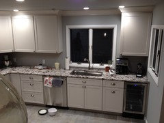 Kitchen sink NOT centered w/window. Which sink will disguise it?