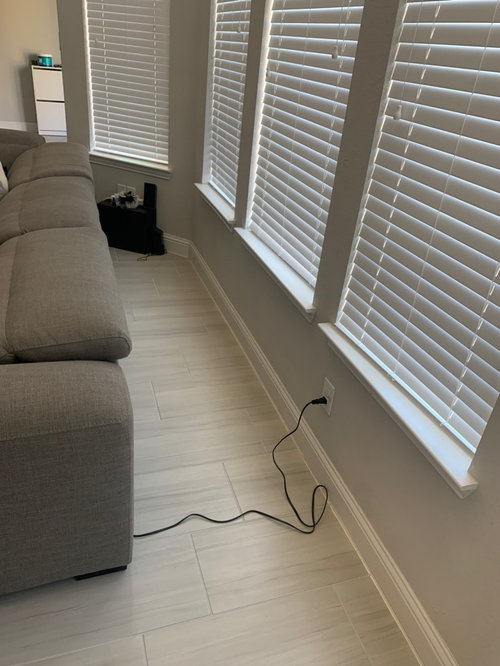 space between sectional & windows