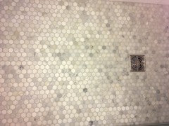 Marble tile discoloration in shower