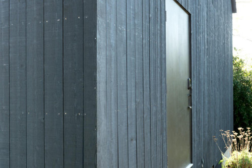 Modern fiber cement vertical siding: 5" width with nickel gaps. Help!