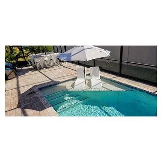 The Villages Parallelogram Pool with bold angled steps - Contemporary ...