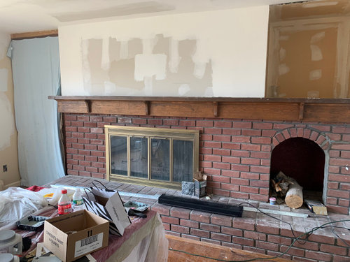What to do with a huge 1960s asymmetrical brick fireplace?