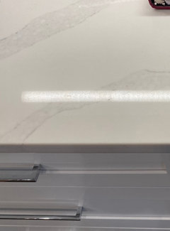 weird blemishes and cloudy areas on quartz countertop