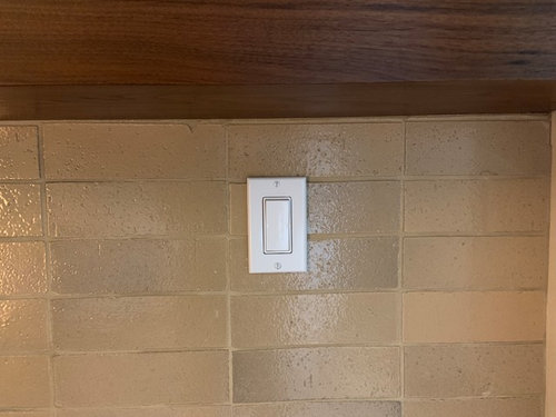 Electric switch on fireplace