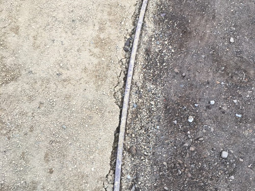 Expansion Cracks along SOME edges of DG? Reasons for this??