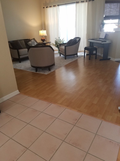 How to match in open floor with rugs