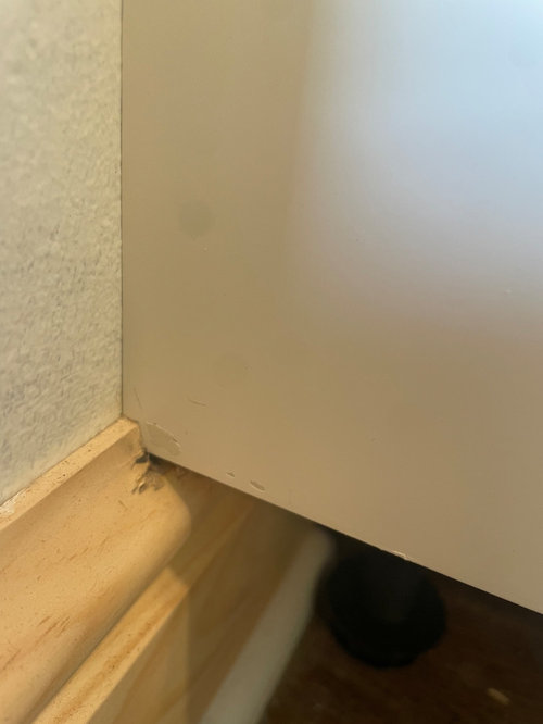 Brand new custom painted cabinets chipped and dinged