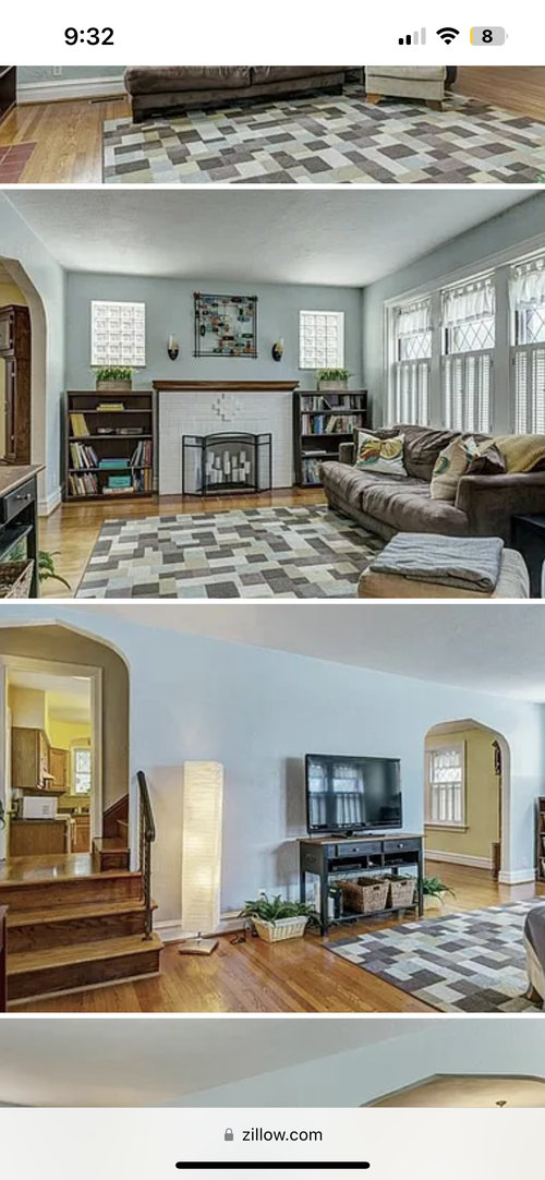 How to deal with double plaster arches in living room?