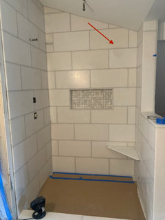 Grout bleeding into marble tiles