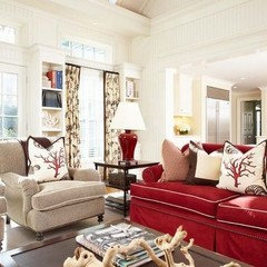 How do I use a red traditional sofa in a neutral room?