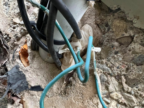 Best way to waterproof hole for electrical wires in exterior concrete