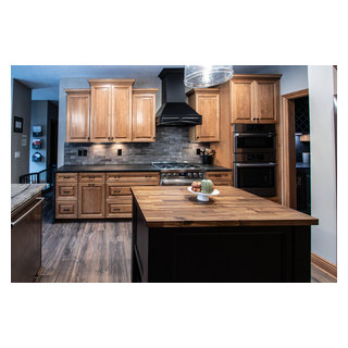 Reconfigured kitchen with new islands, countertops, backsplash ...
