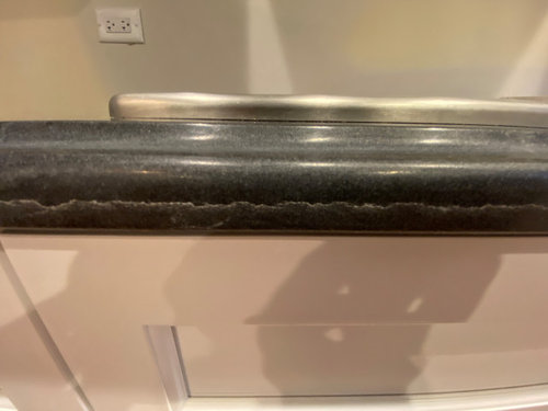 Countertop Crack, Fissure or broken piece reattached?