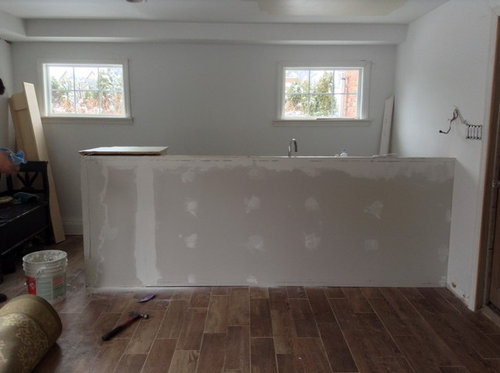 Bar- sheet rock to bar and treat it like the wall? or tile the bar?