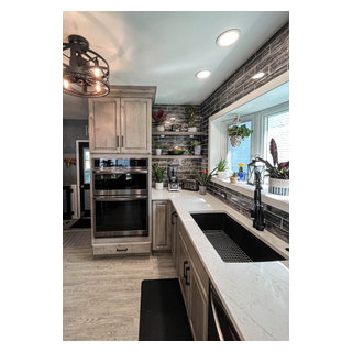 Neutral Monochromatic Gray Kitchen with Tiled Backsplash - Transitional ...