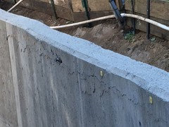 Concrete Retaining wall spalling - Seeking Solutions