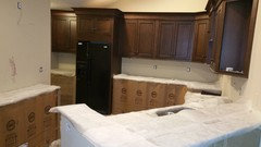 How to protect new cabinets during continued construction?