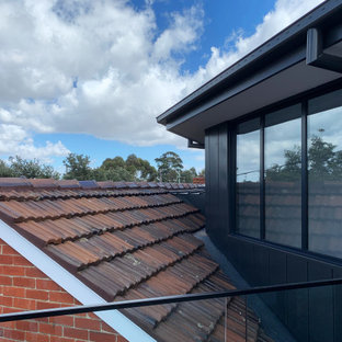 75 Beautiful Metal Exterior Home With A Clipped Gable Roof Pictures ...