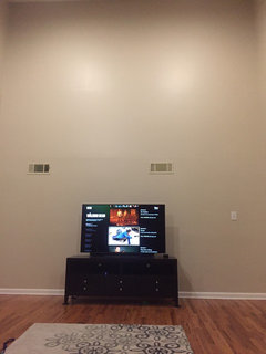 How to decorate living room with half vaulted ceiling