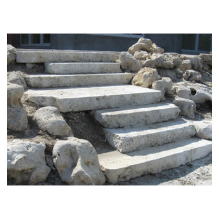 Coral steps with native Florida cap rock boulder retaining wall ...
