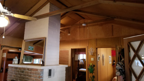 What do I do with this monster fireplace hulking mid room?