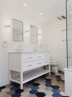 Bathroom Finishes - Navy Vanity, Granite, and Tile