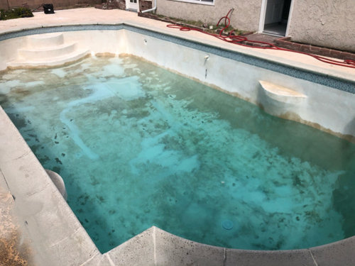 Pool wall discolored after acid wash