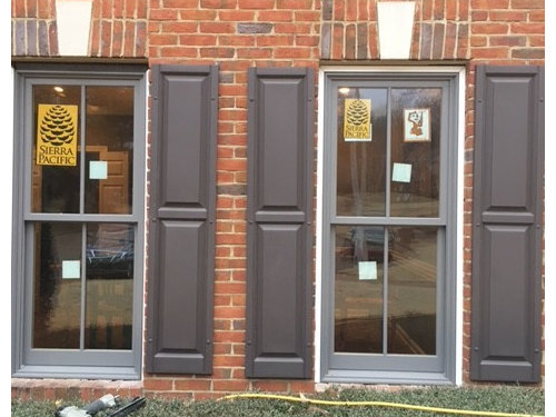 Painted brick with stone key above windows