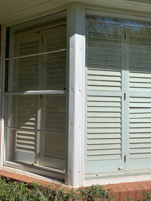 steel post hidden between windows?