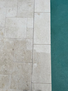 HELP!! Mystery stains on new marble pool deck