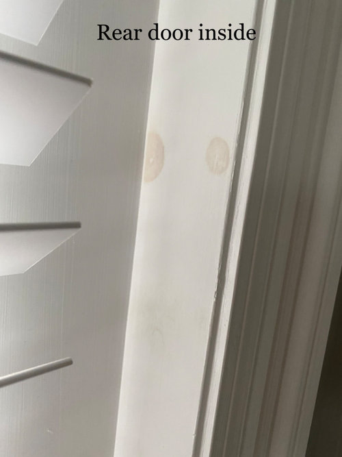 Paint discoloration around front and rear door trim