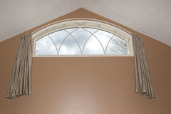 Ideas for Functional Shade for Large Eyebrow Arch Window